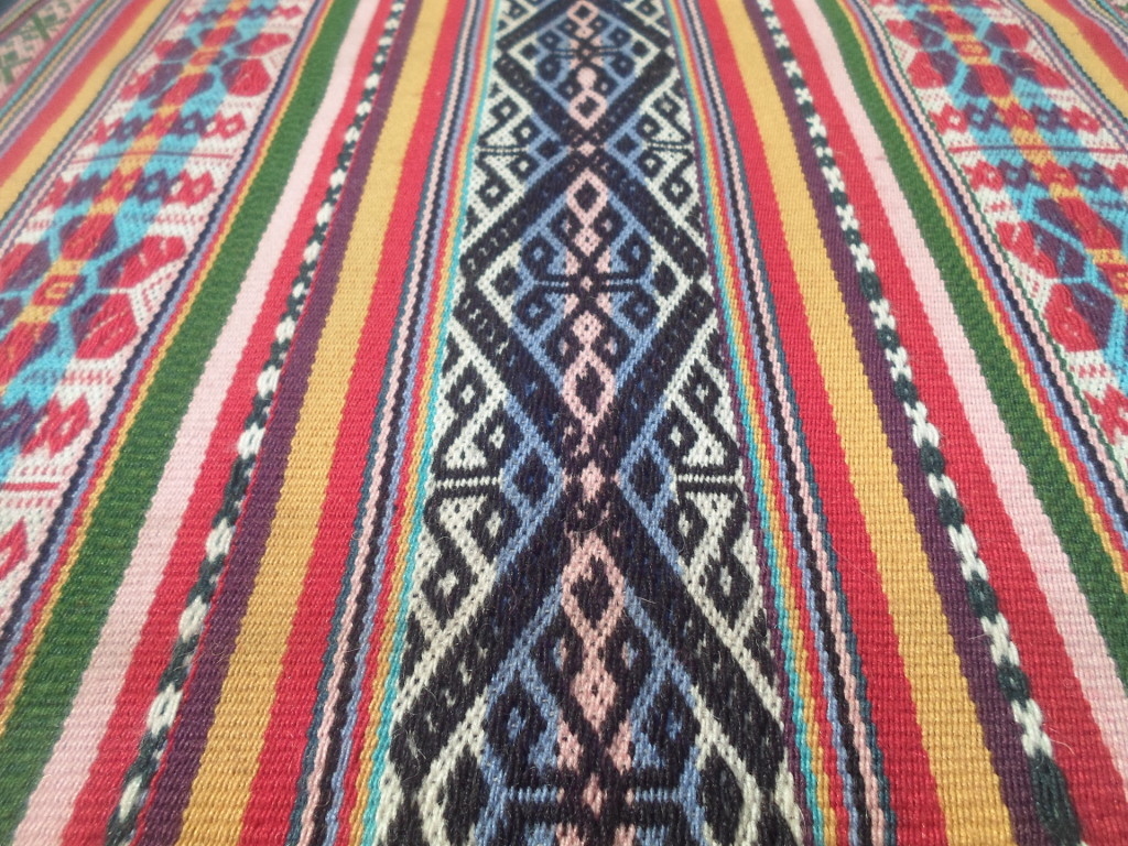 Traditional Peruvian alpaca poncho "Huayruros" | Inka Market